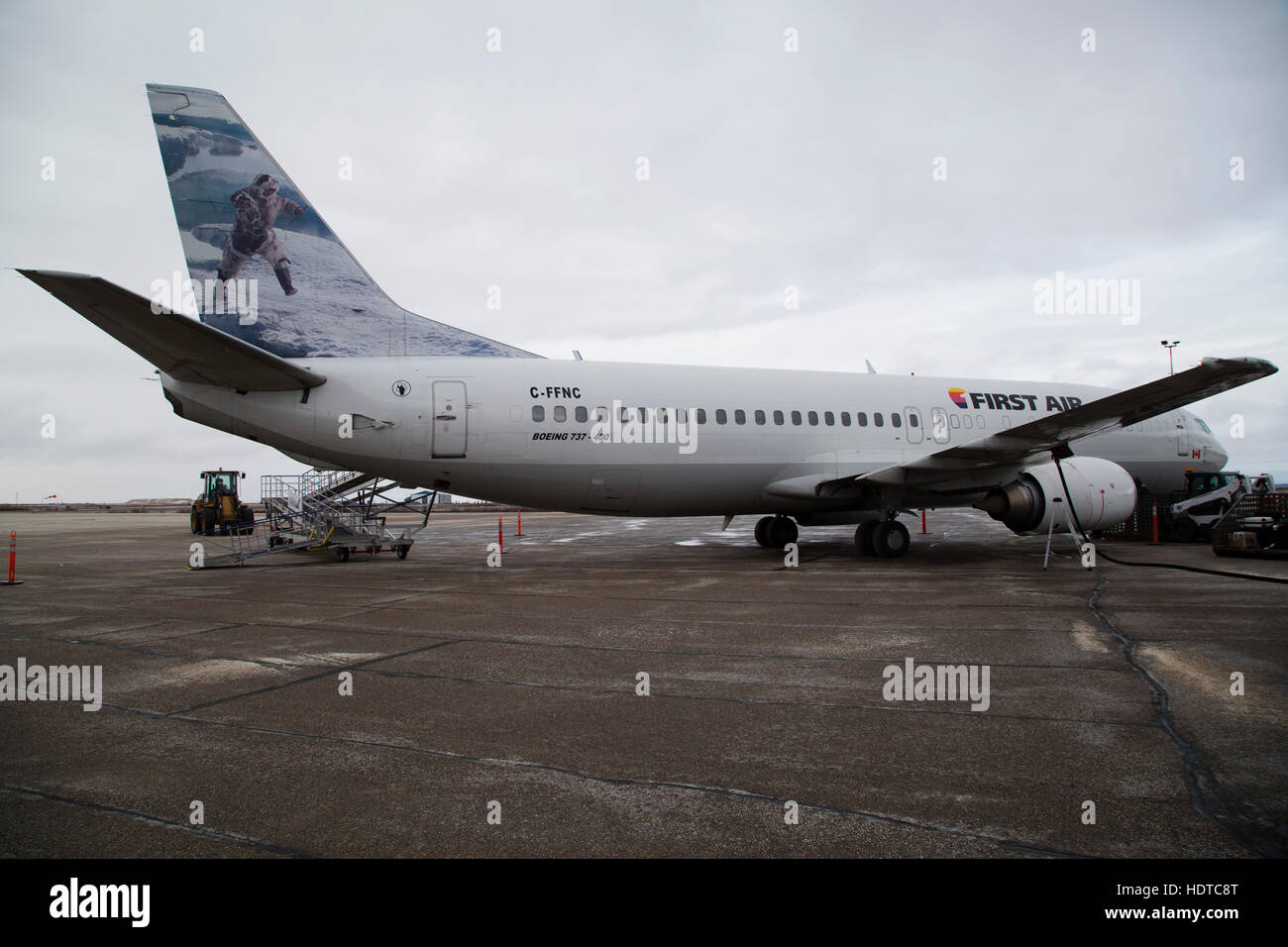 A First Air jet airliner on the runway at Churchill, Canada. Churchill ...