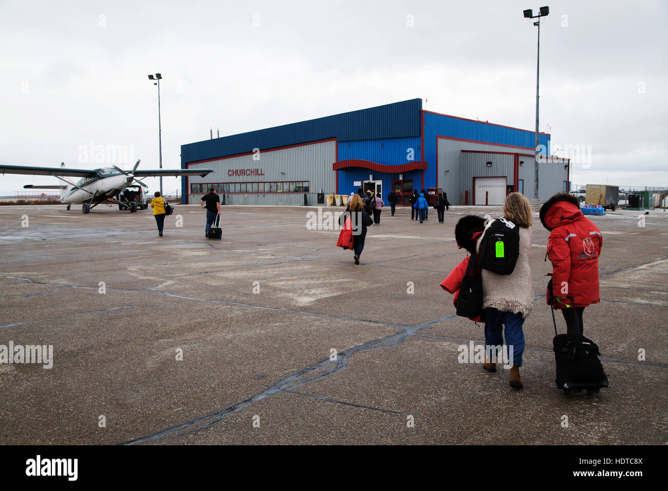 People on the runway at the airport in Churchill, Manitoba, Canada ...