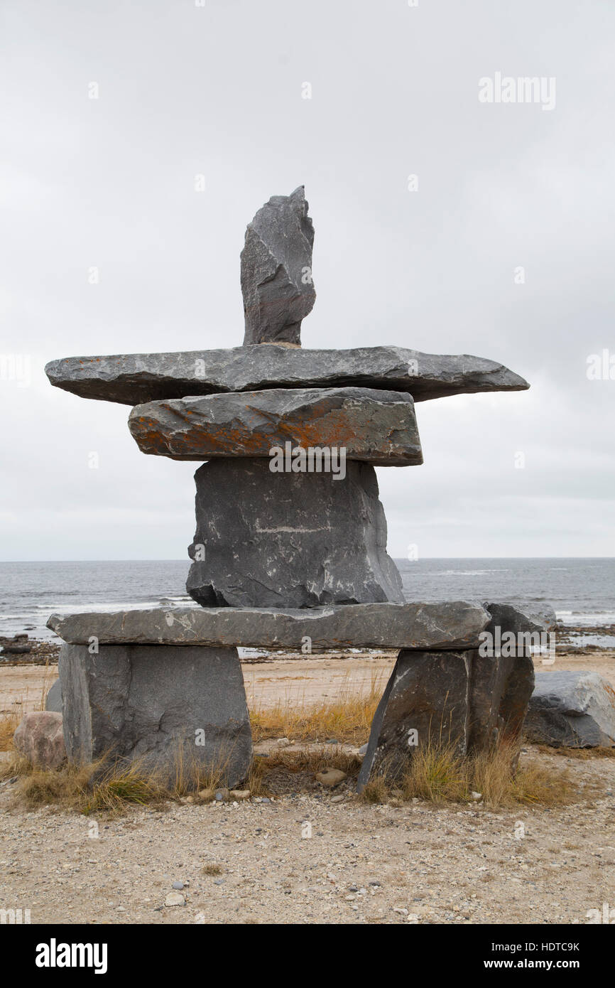 An Inukshuk on the shore of the Hudson Bay in Churchill, Canada ...