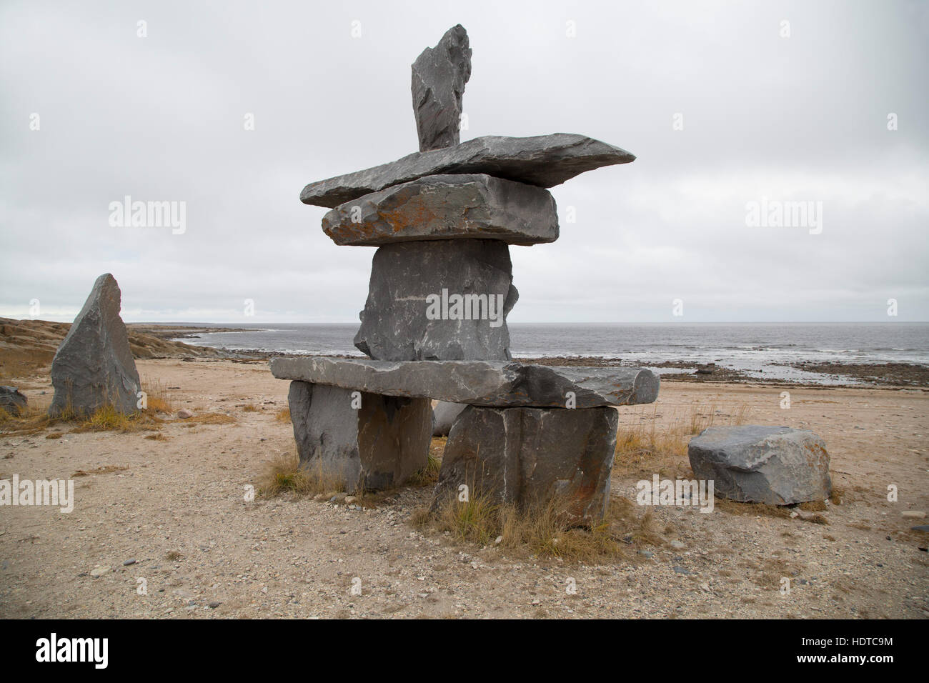 An Inukshuk on the shore of the Hudson Bay in Churchill, Canada ...