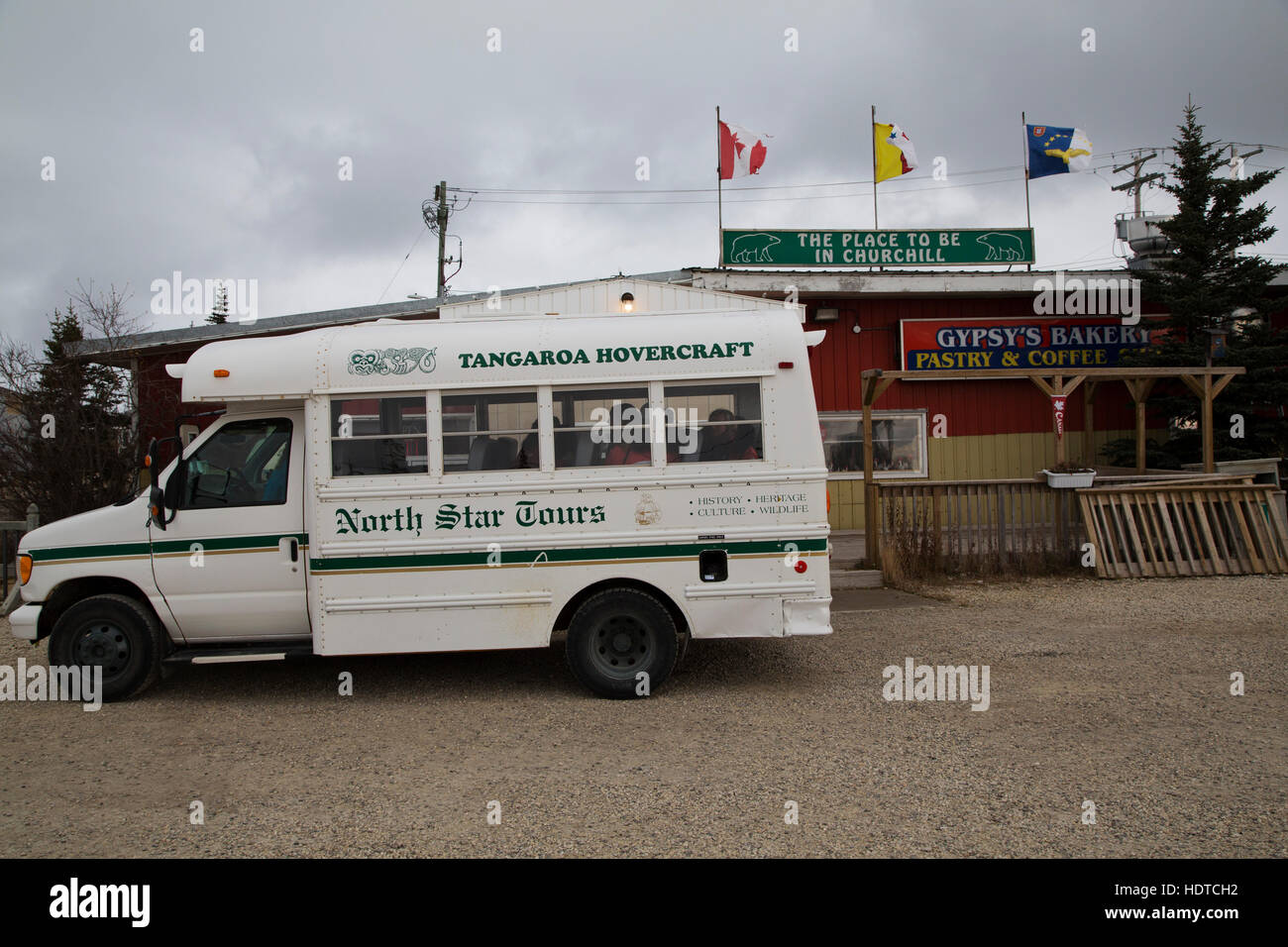 A tour bus outside of Gypsy's Bakery in Churchill, Canada.The ...