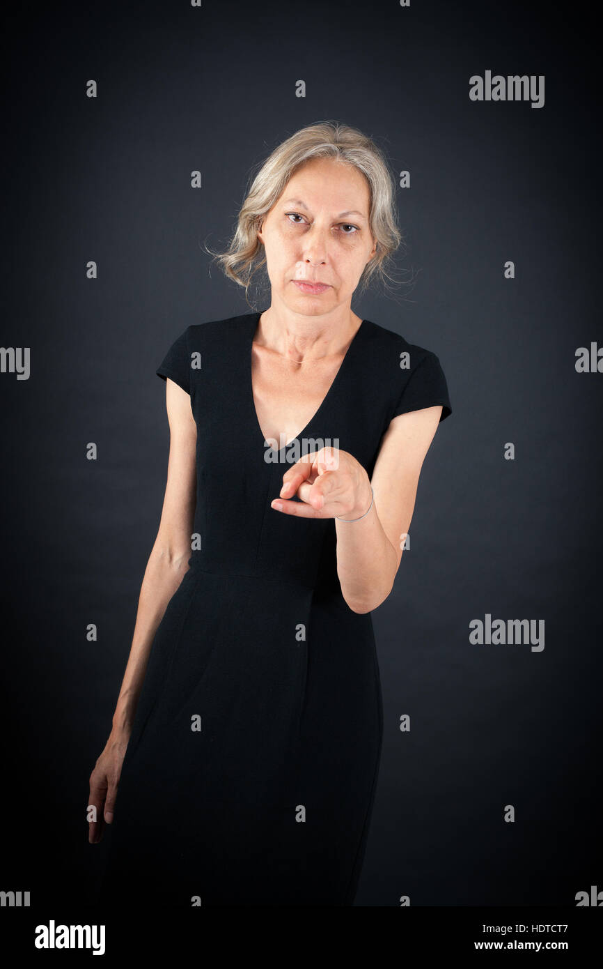 Beautiful woman doing different expressions in different sets of ...