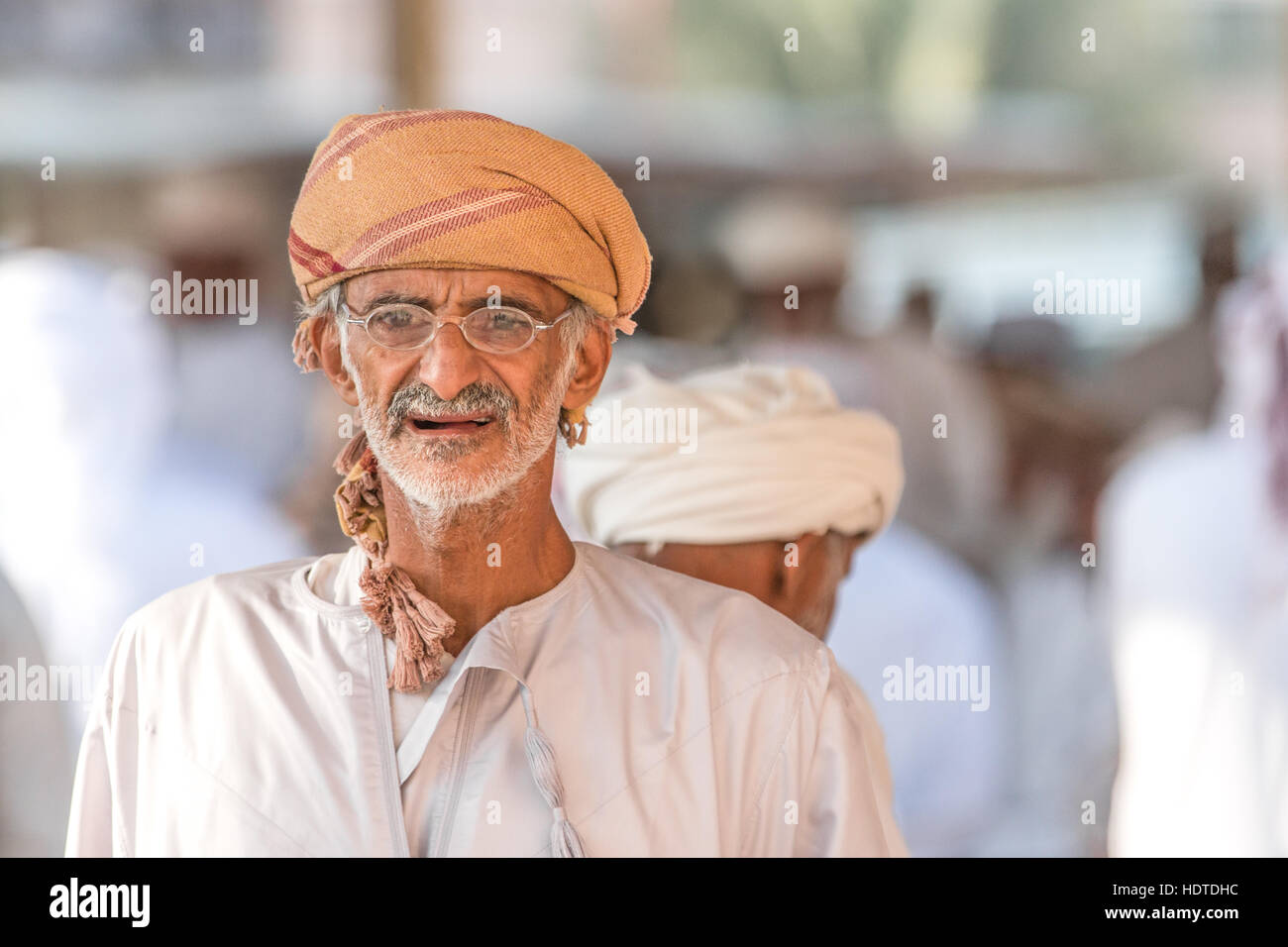 Portrait of an Omani man in traditional Omani clothing attending a ...