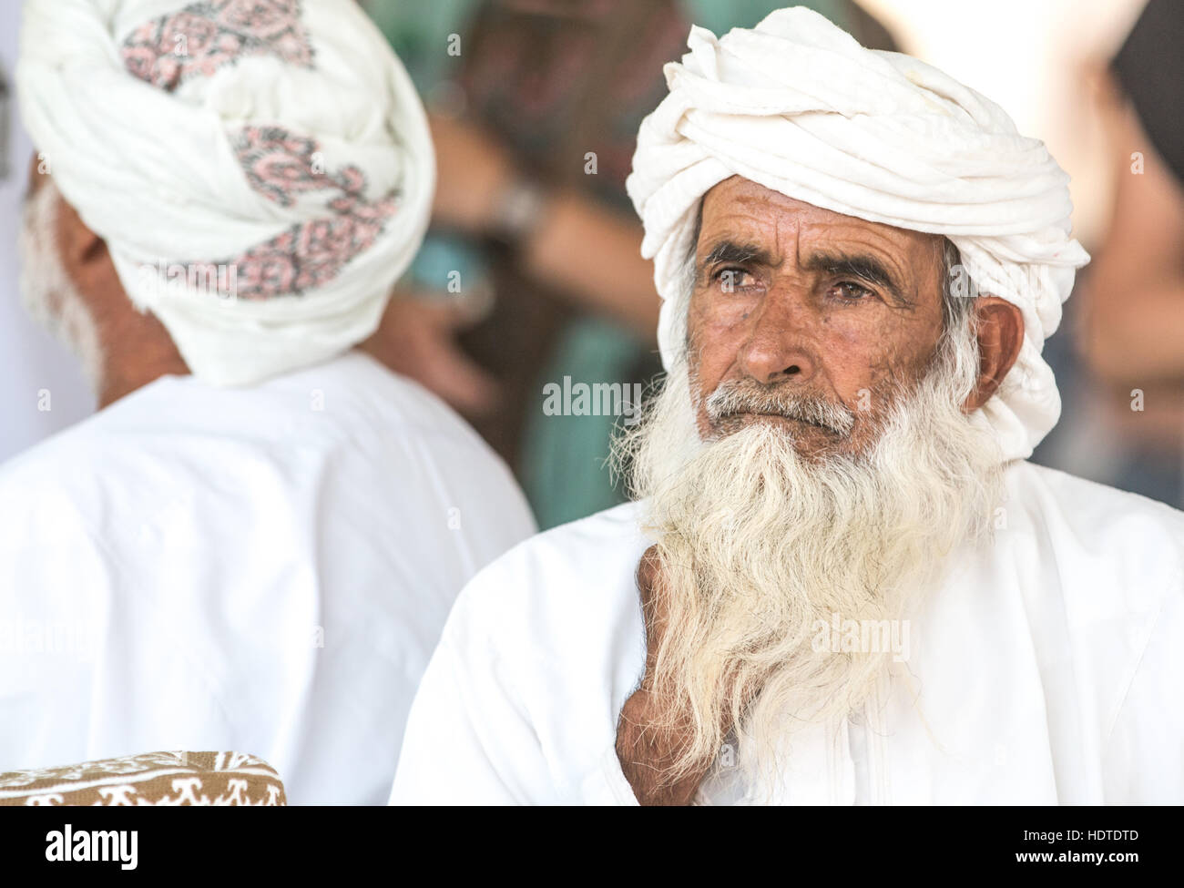 Portrait of an Omani man in traditional Omani clothing attending a ...