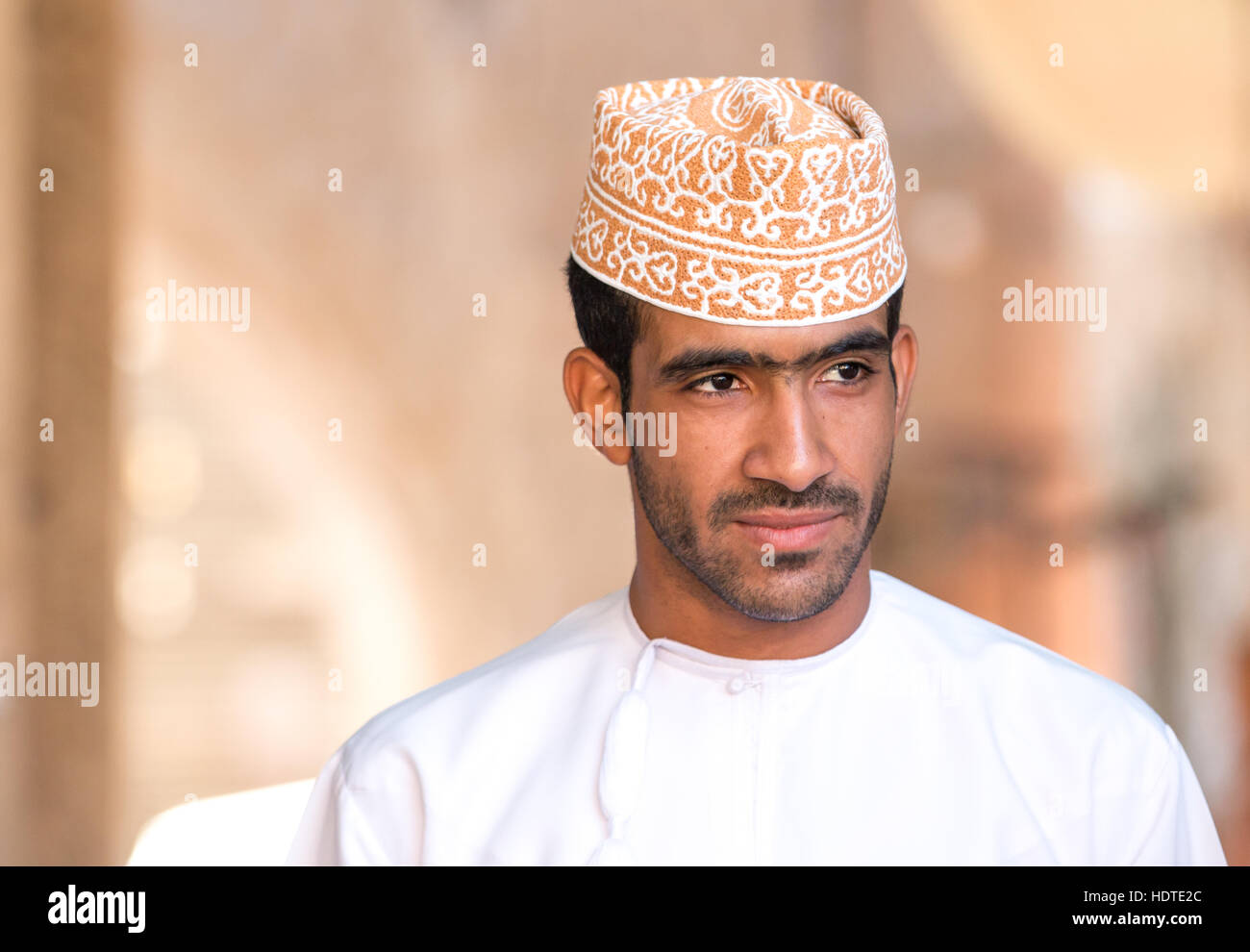 Portrait of an Omani man in traditional Omani clothing attending a ...