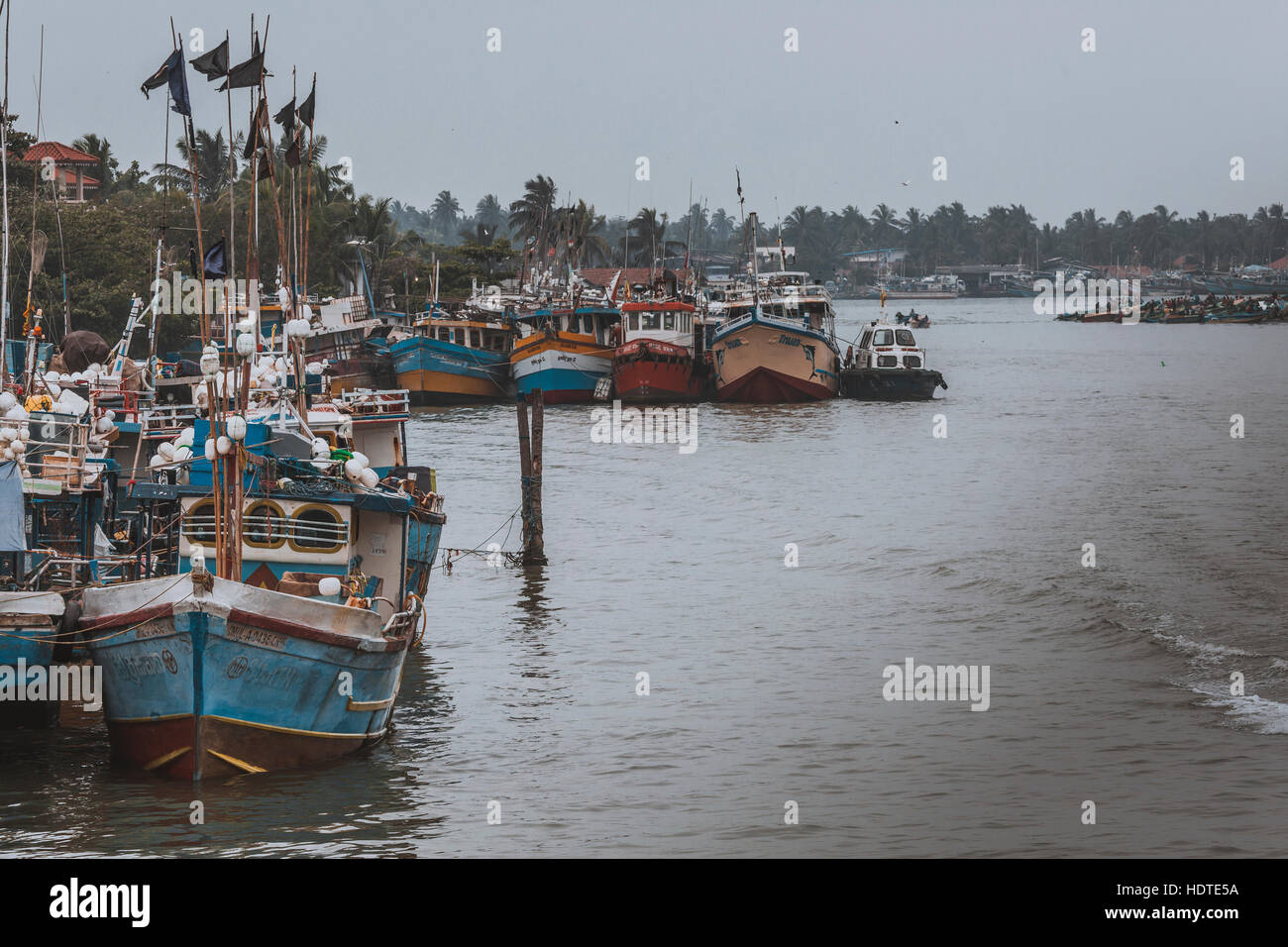 NEGOMBO, SRI LANKA - NOVEMBER 30: Local fishermen and their boats in ...