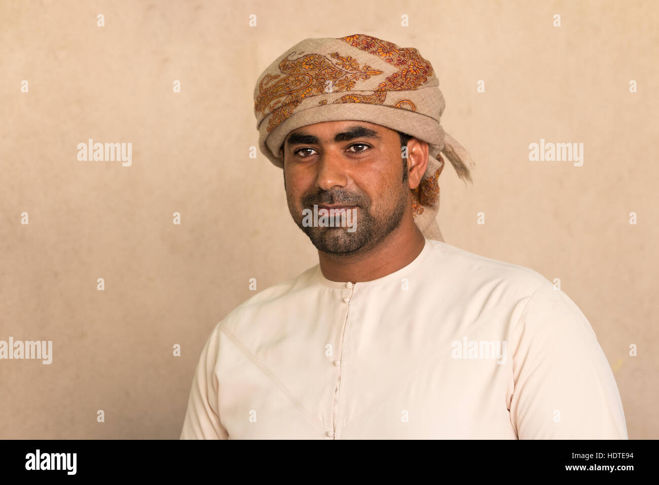 Nizwa, Oman – Oct 14, 2016. Portrait of an Omani man in traditional ...