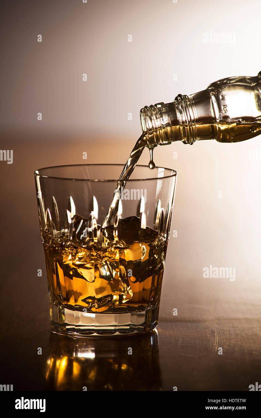 Pouring scotch glass hi-res stock photography and images - Alamy