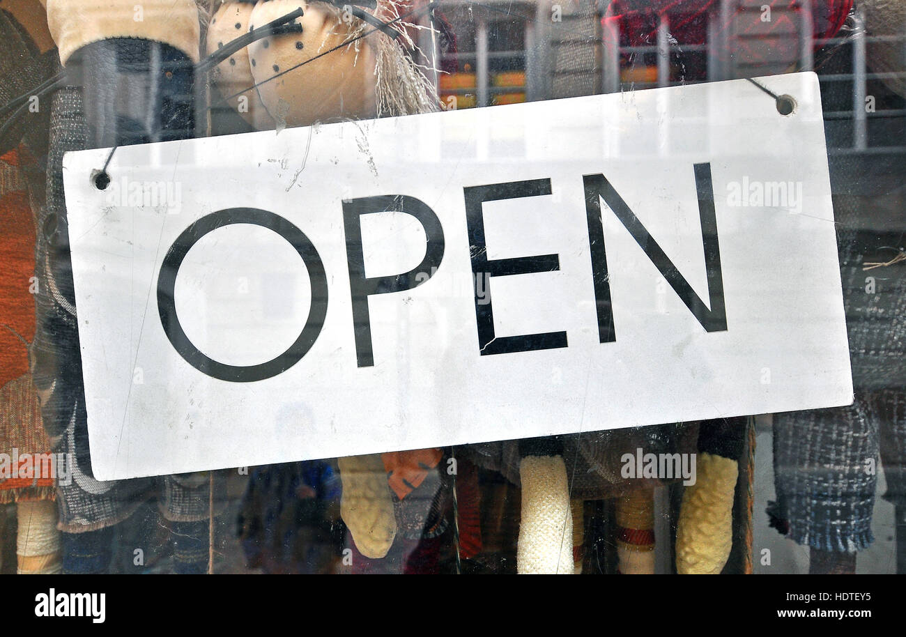 Black and white hanging Open sign in the street Stock Photo - Alamy