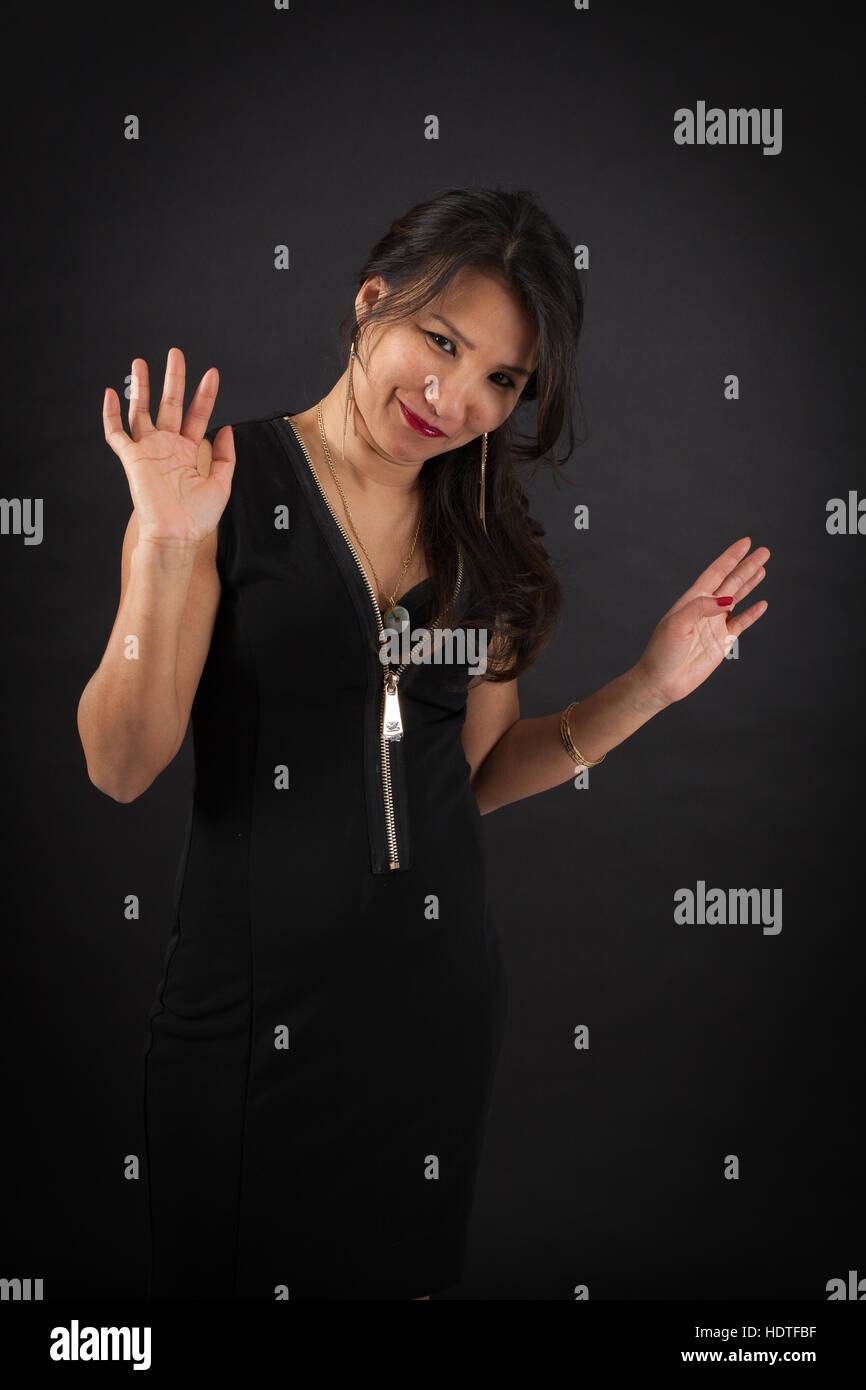 Beautiful woman doing different expressions in different sets of clothes: innocent Stock Photo ...