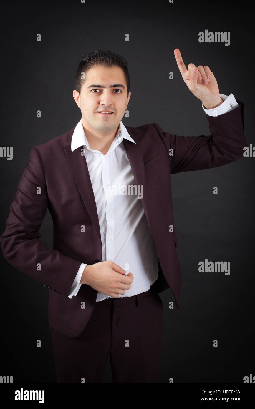 Handsome man doing different expressions in different sets of clothes ...