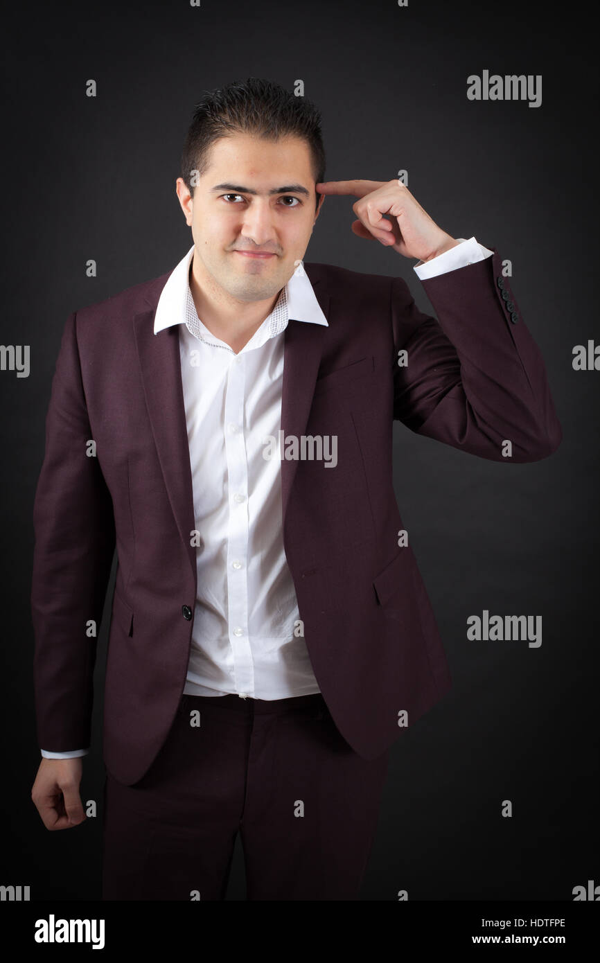 Handsome man doing different expressions in different sets of clothes ...