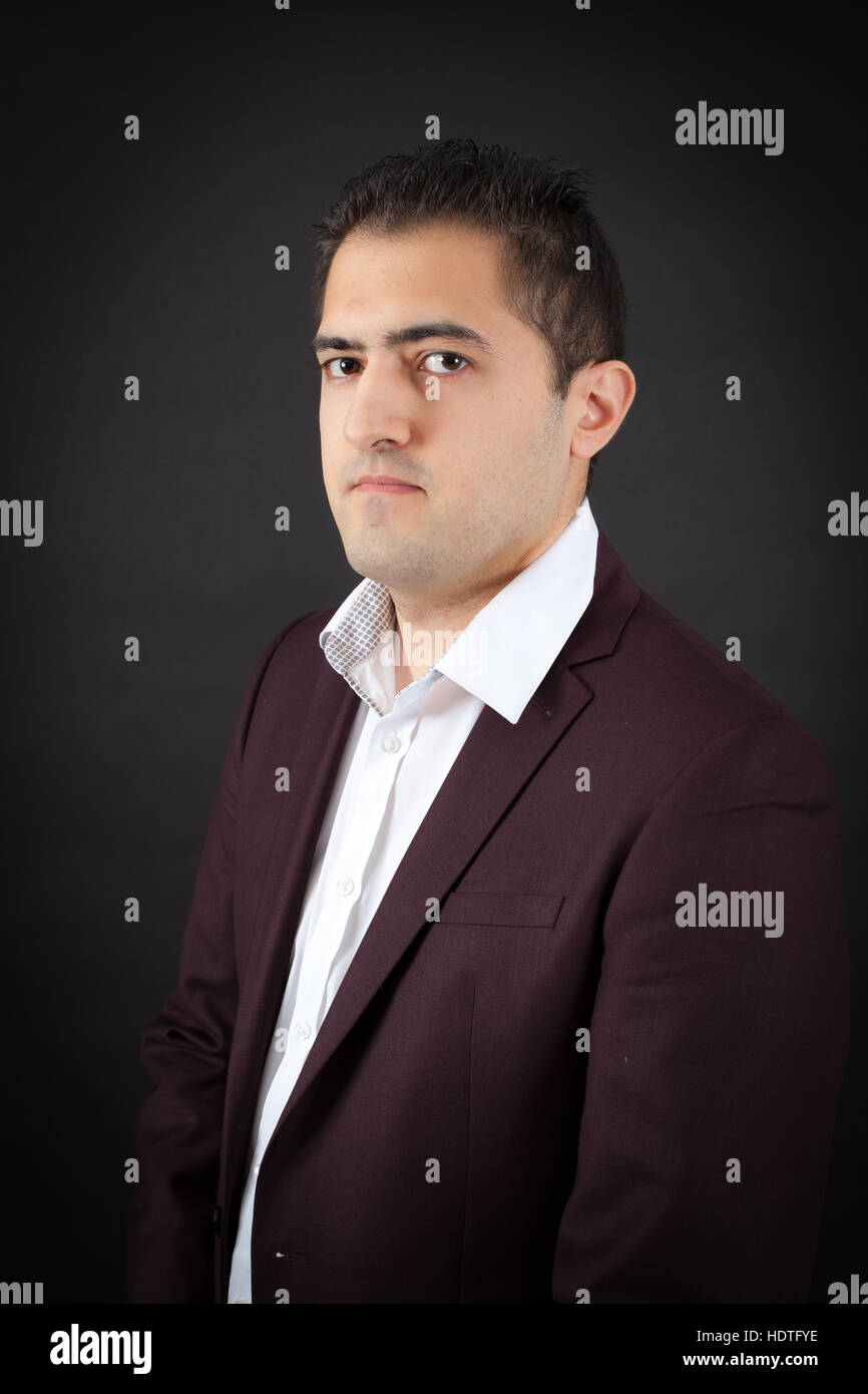 Handsome man doing different expressions in different sets of clothes ...