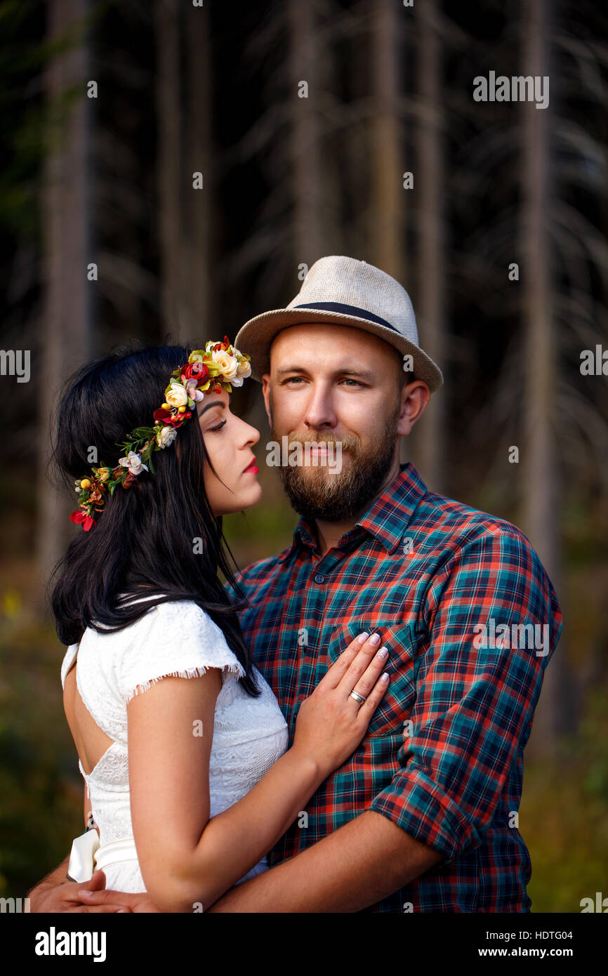 newly married loving couple in forest Stock Photo - Alamy