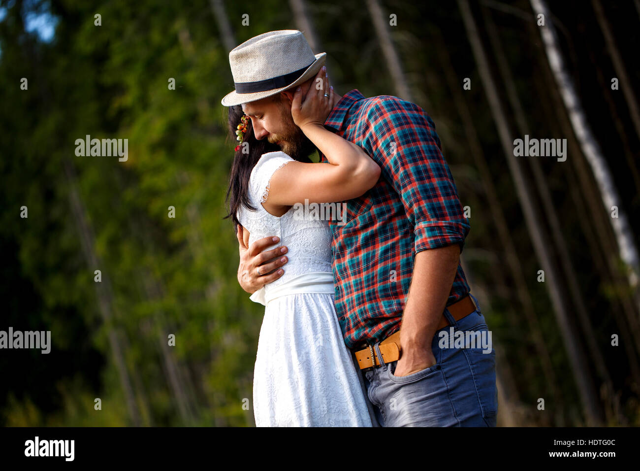romantic loving couple in forest Stock Photo - Alamy