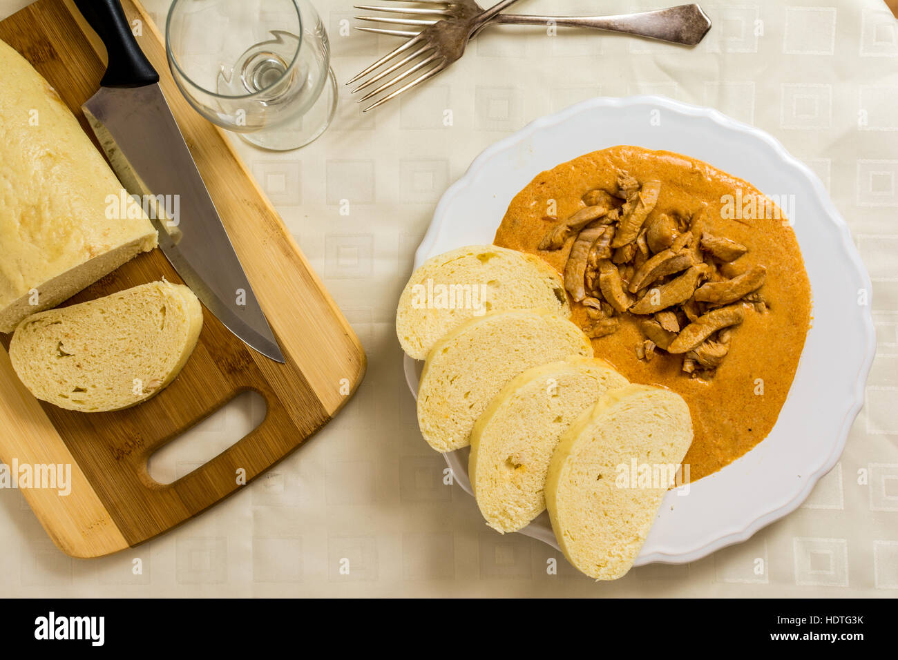 Traditional Czech cuisine chicken on red pepper with dumplings Stock ...
