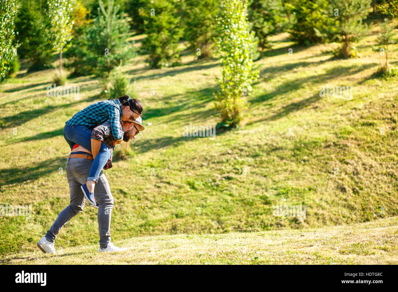 loving couple have fun in field Stock Photo - Alamy