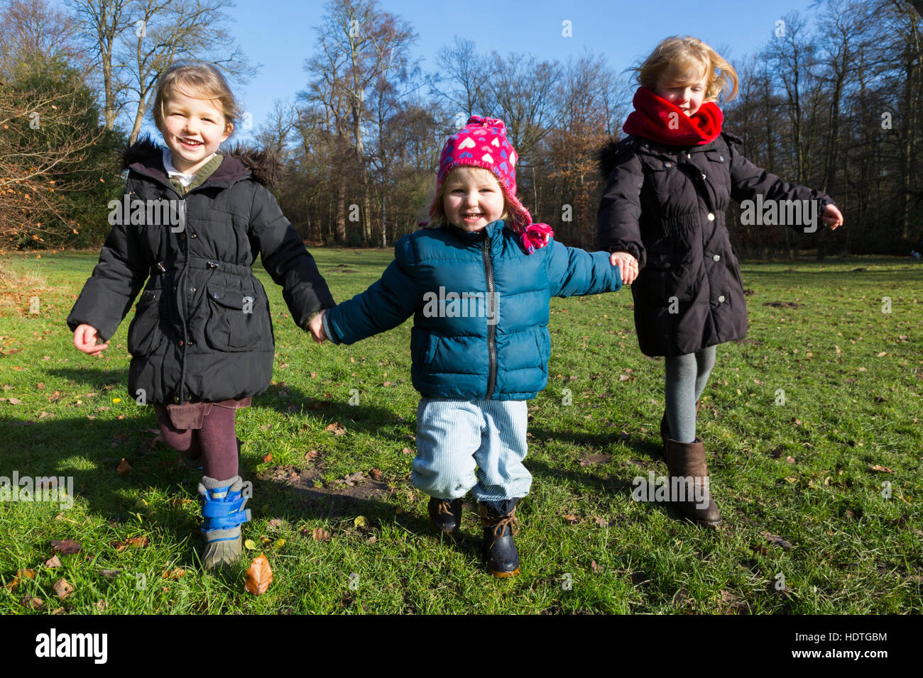 Three sisters: girls age 4, 2 & 6 years, four, two, and six year old ...