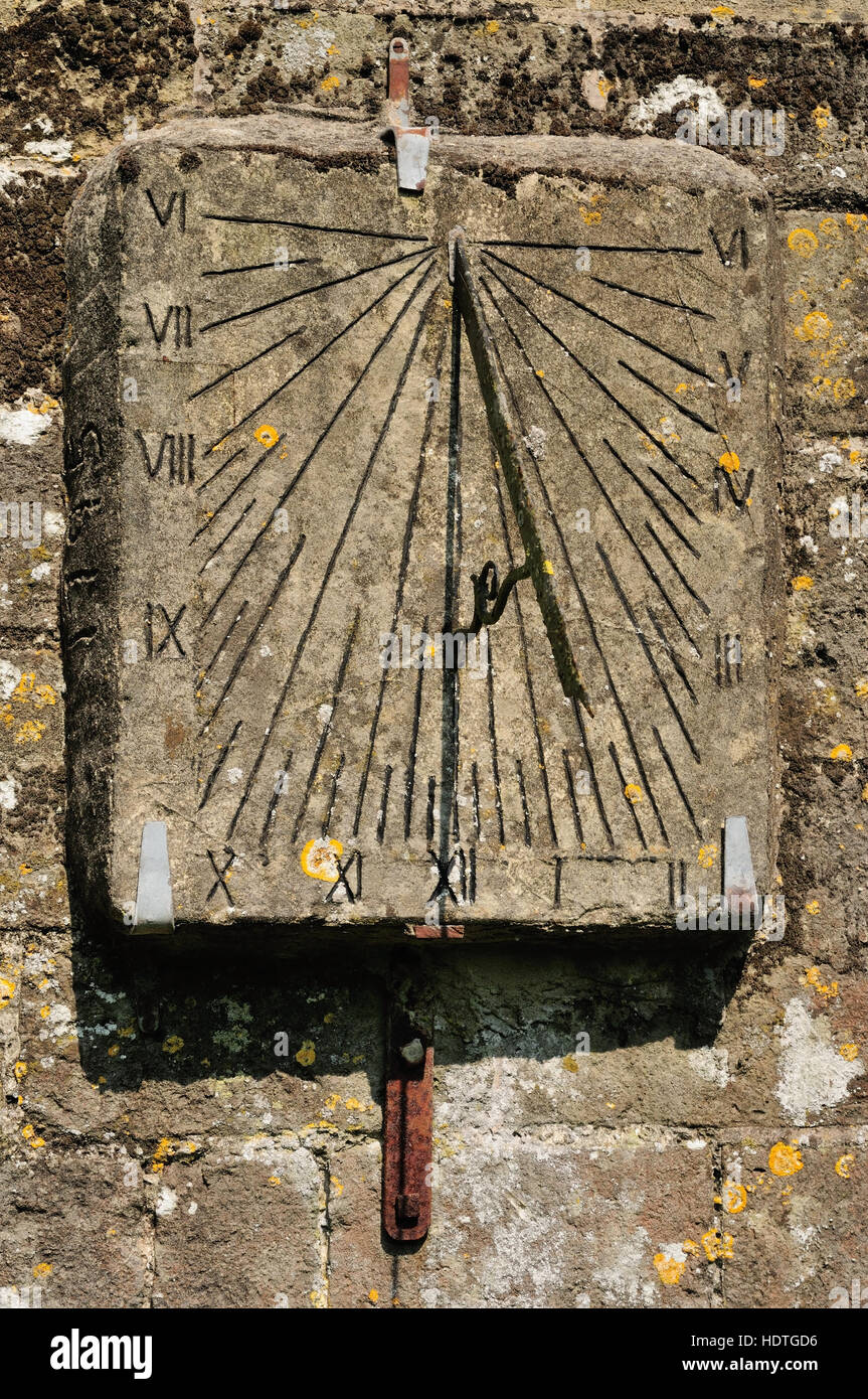 Sundial on the wall of St Mary's church, Kilmington Stock Photo - Alamy