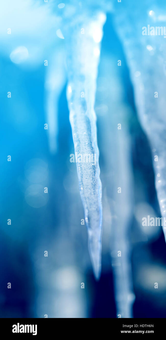 Photos background with wonderful clear blue icicle Stock Photo - Alamy