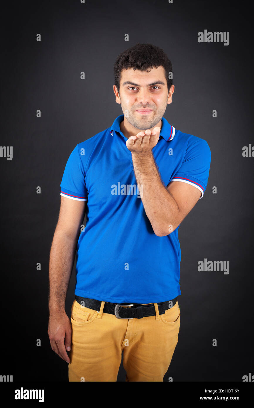 Handsome man doing different expressions in different sets of clothes ...