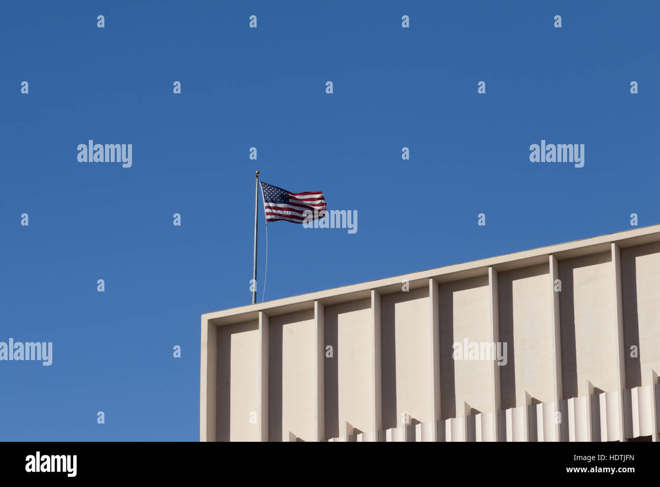 American flag flying on building hi-res stock photography and images ...
