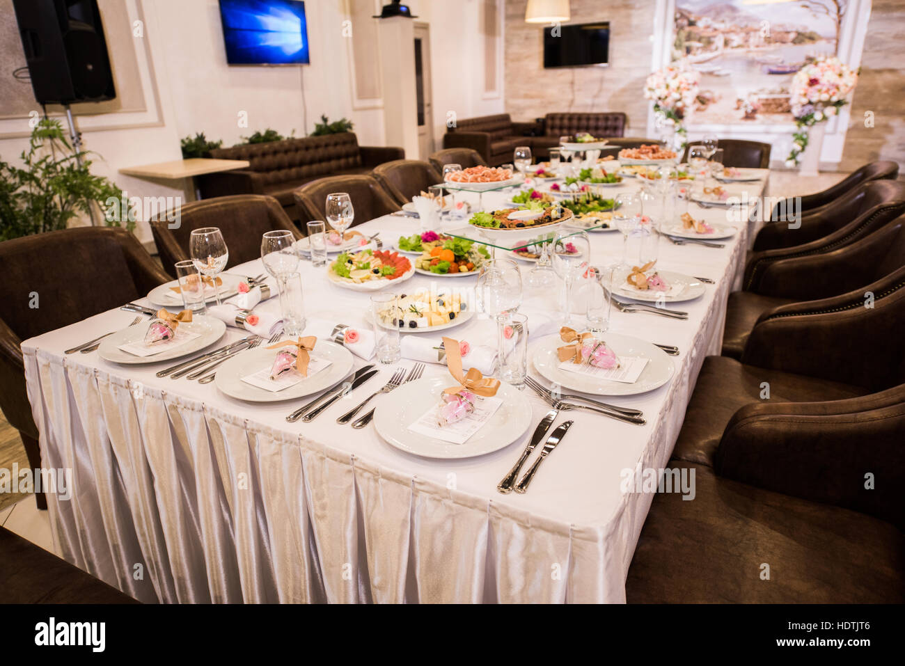Beautifully organized event - served banquet table ready for guests ...