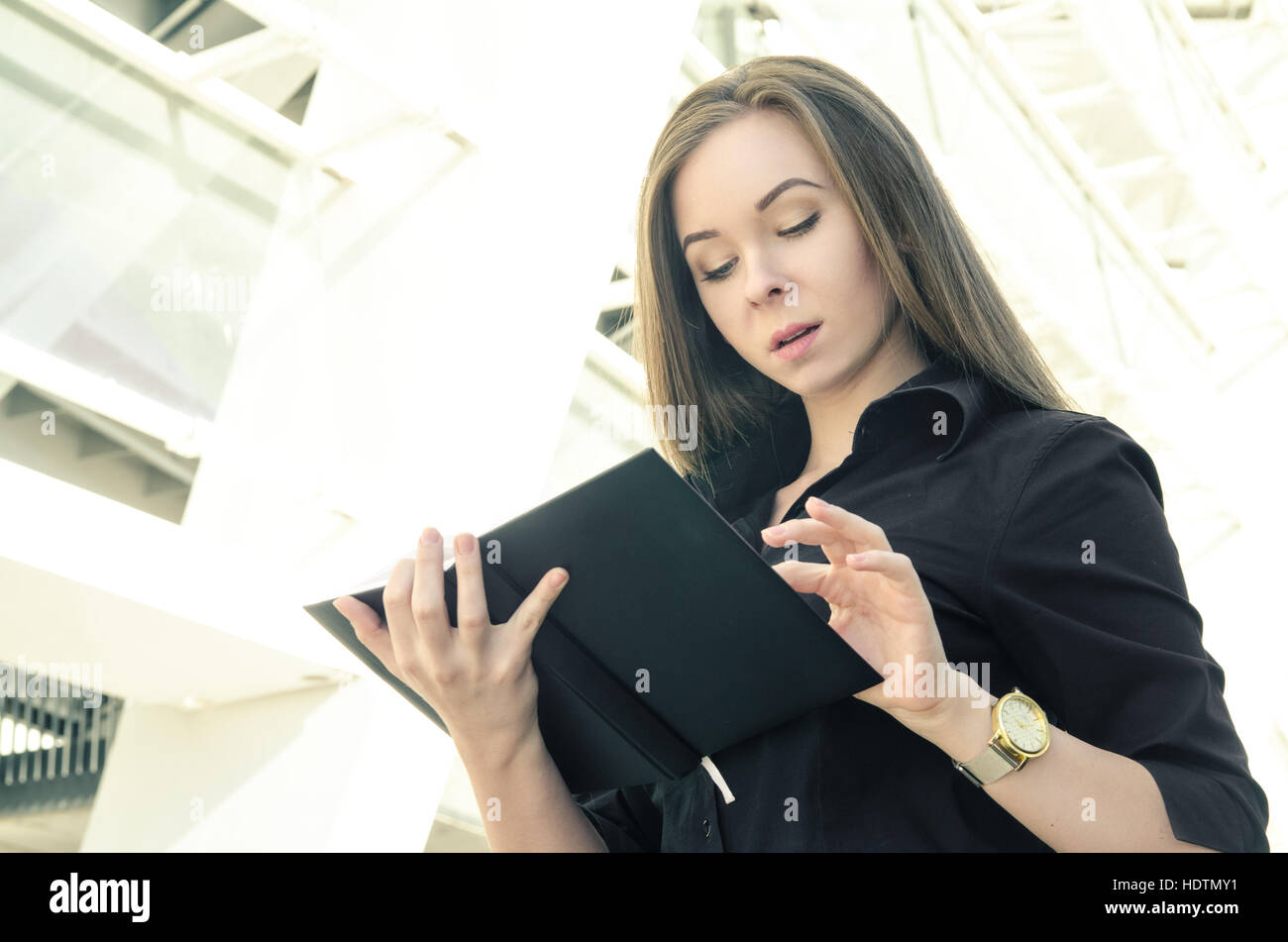 Beautiful businesswoman in blue hi-res stock photography and images - Alamy