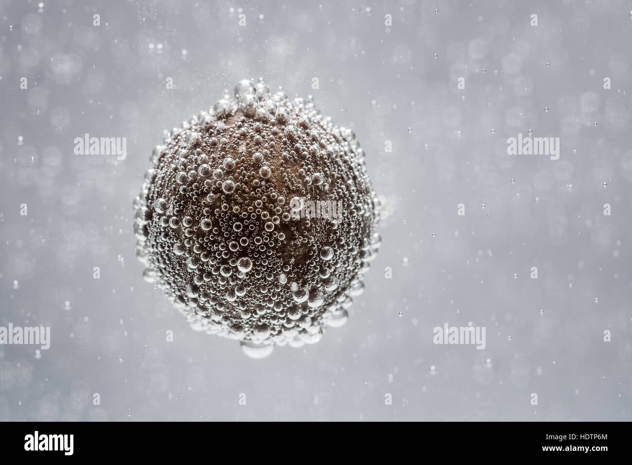 round chocolate in the water with bubbles. seamless texture Stock Photo ...