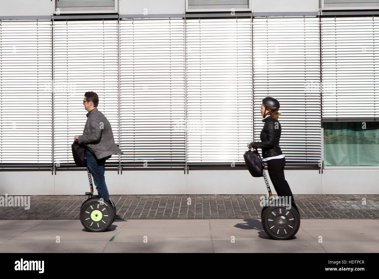 Europe, Germany, Cologne, Segway Driver at the Rheinau harbour, guided ...