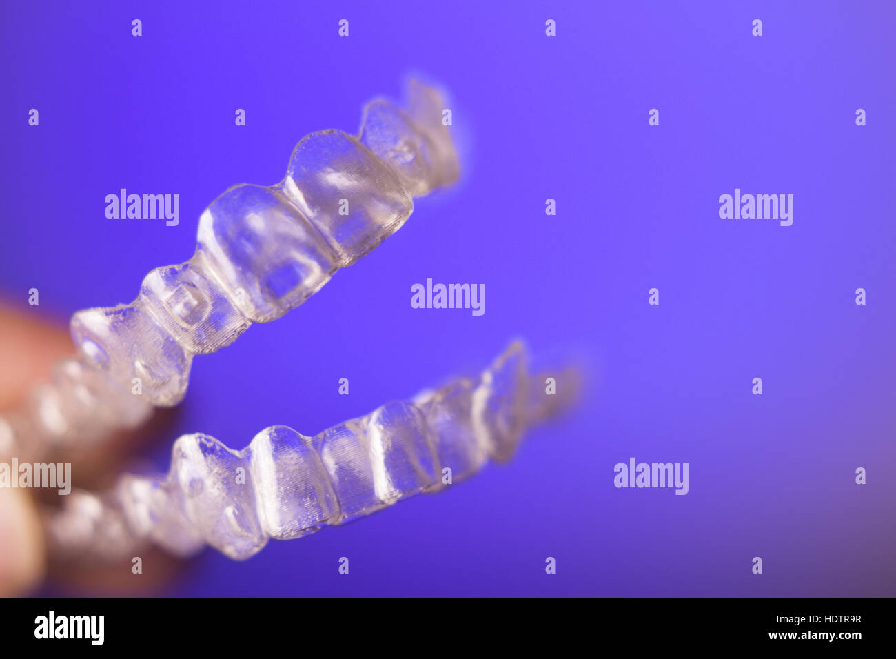 Transparent dental orthodontics for adults and children Stock Photo - Alamy