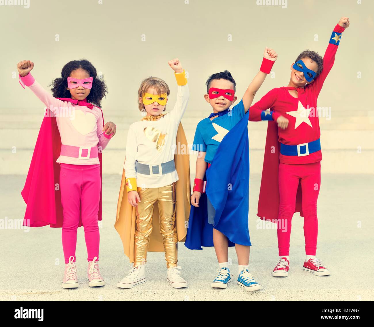 Superheroes Cheerful Kids Expressing Positivity Concept Stock Photo - Alamy