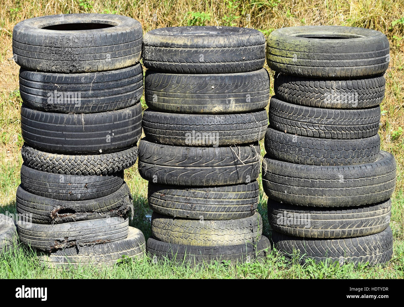 Old ruined tires Stock Photo - Alamy