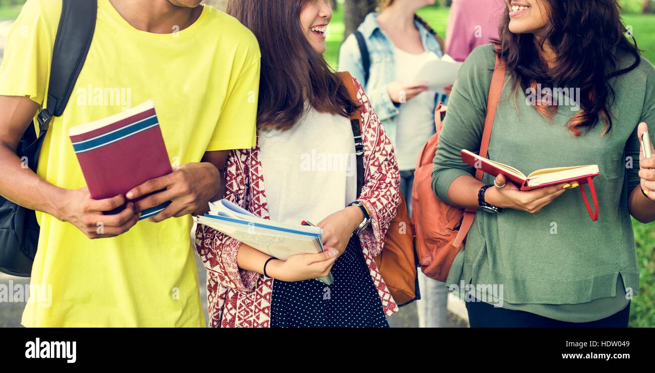 Diverse Young Students Book Outdoors Concept Stock Photo - Alamy