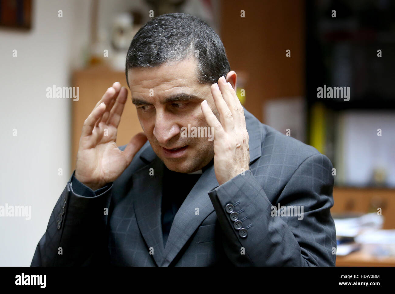 Father Paul Karam, president of Caritas Lebanon, in his office in ...