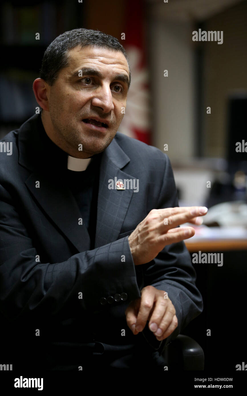 Father Paul Karam, president of Caritas Lebanon, in his office in ...