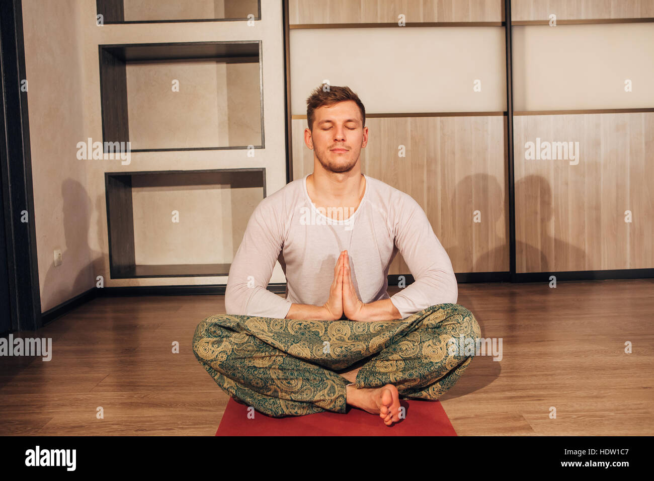 the man in the Lotus position Stock Photo - Alamy