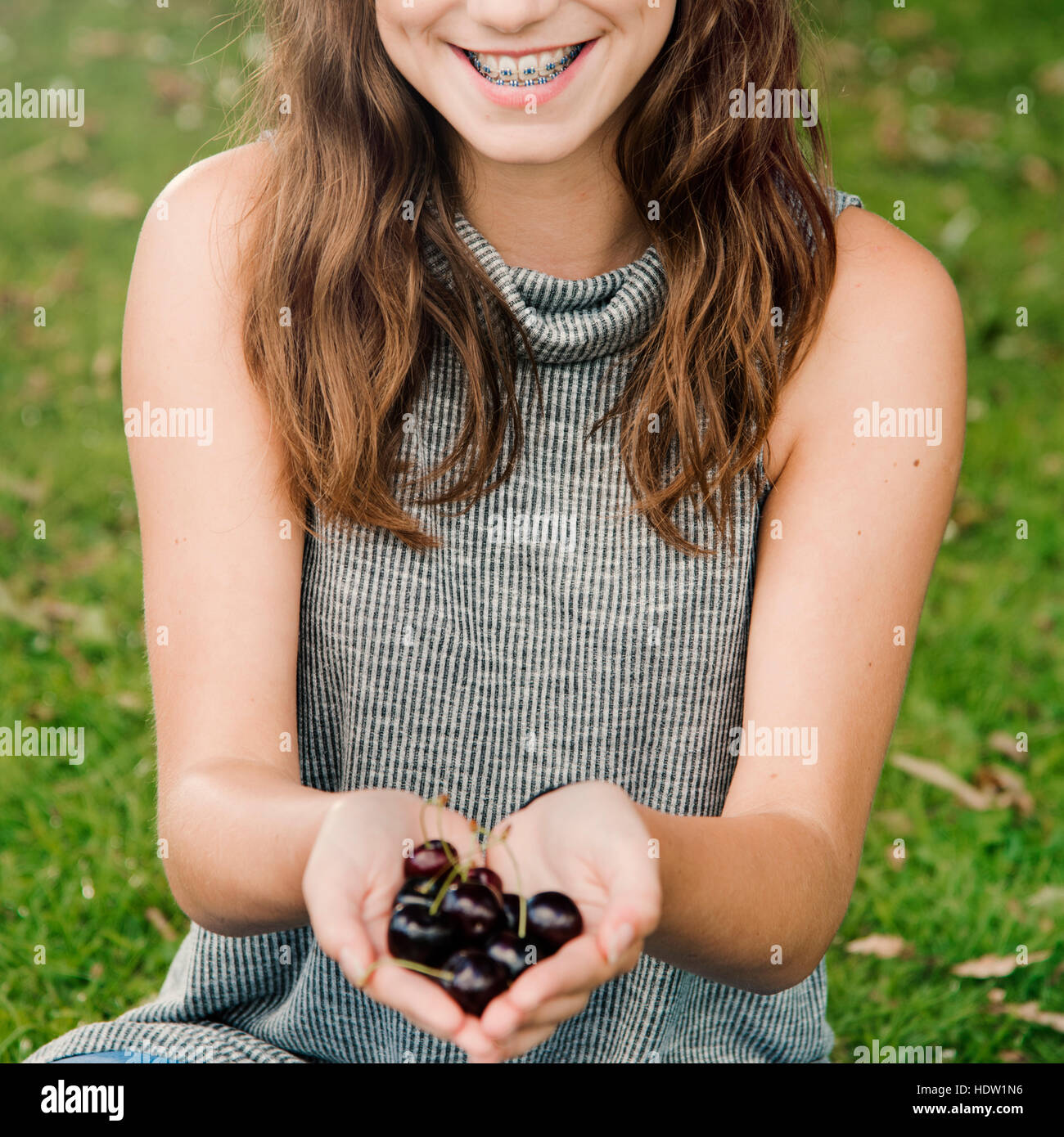 Girl Handful Cherry Smiling Happiness Outdoors Concept Stock Photo - Alamy