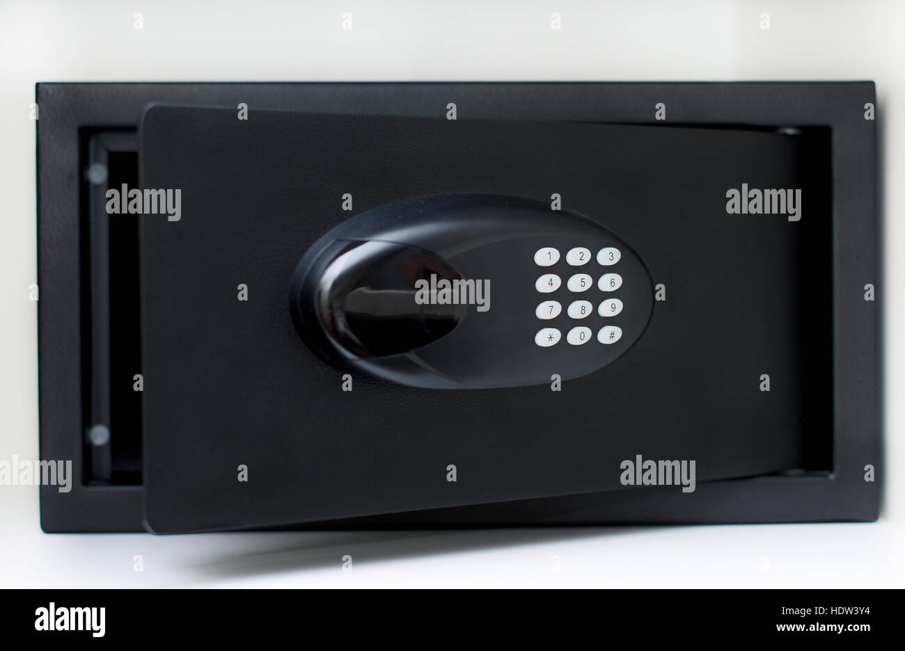 Black small home or hotel safe with keypad Stock Photo - Alamy