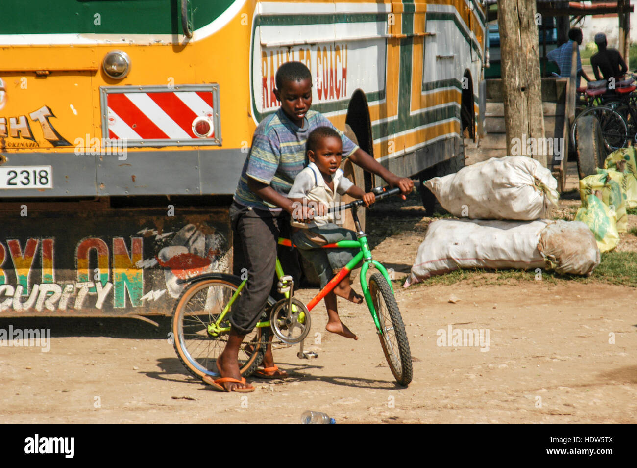 African boy riding a bicycle hi-res stock photography and images - Alamy