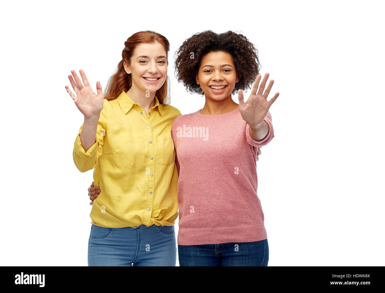 happy smiling women waving hands over white Stock Photo - Alamy
