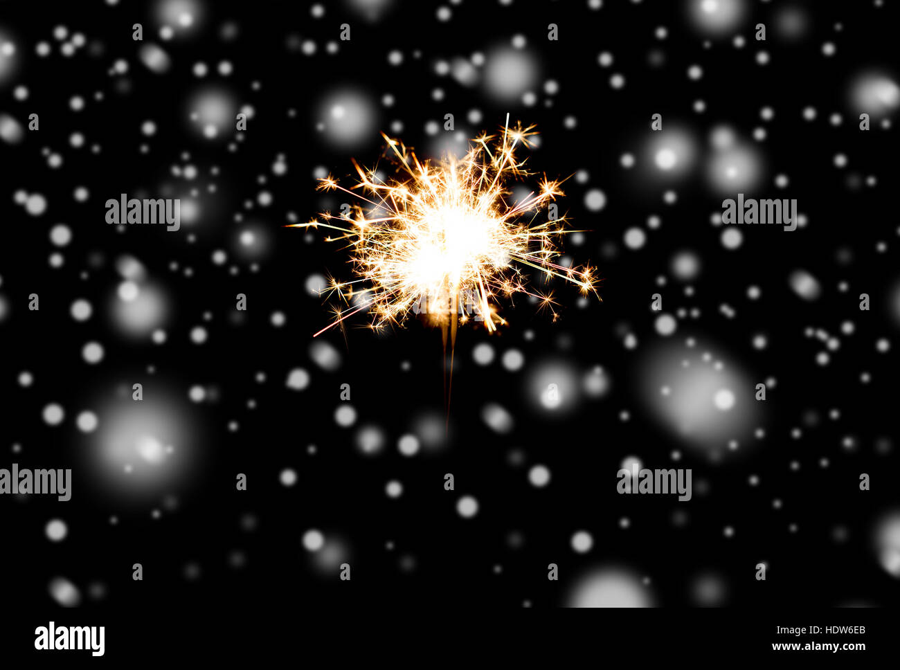 sparkler or bengal light burning over black Stock Photo - Alamy