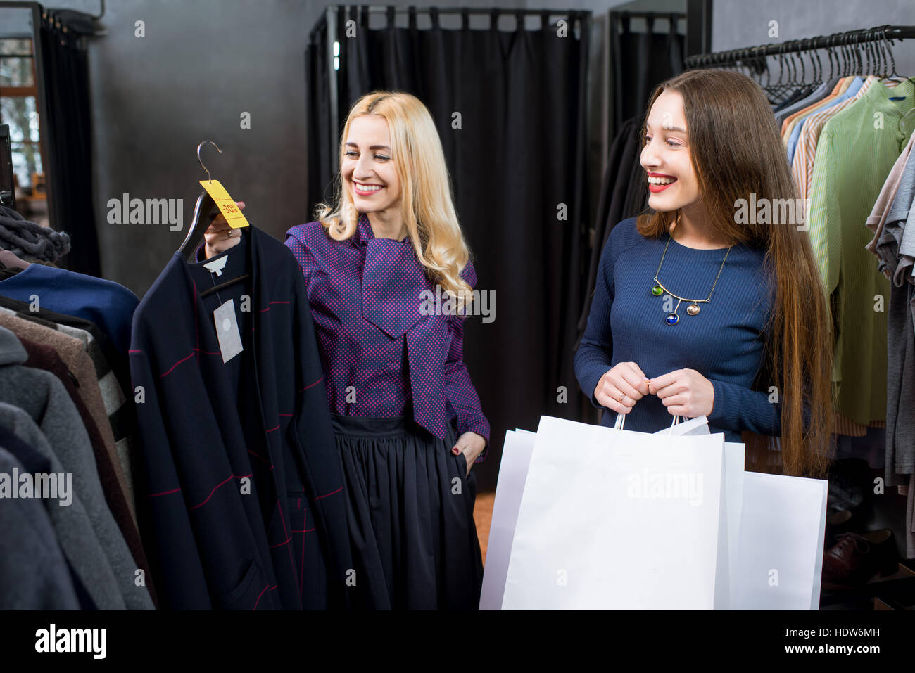 Women shopping clothes Stock Photo - Alamy