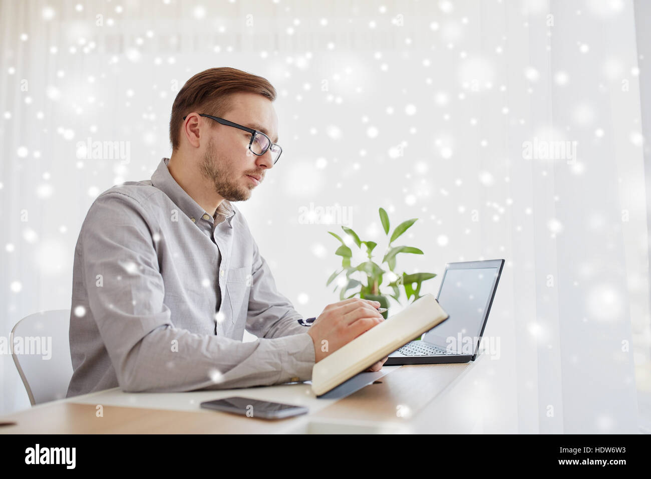 creative man or businessman writing to notebook Stock Photo - Alamy