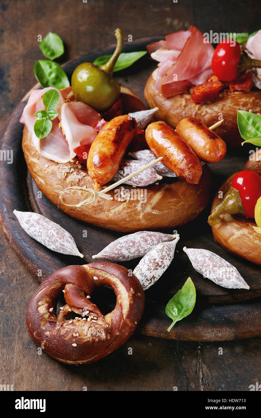 Variety of meat snacks in pretzels Stock Photo - Alamy