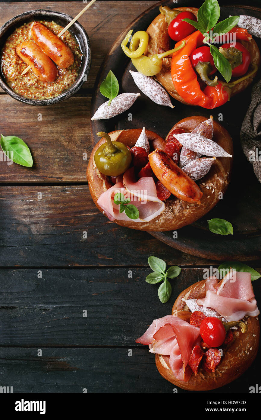 Variety of meat snacks in pretzels Stock Photo - Alamy