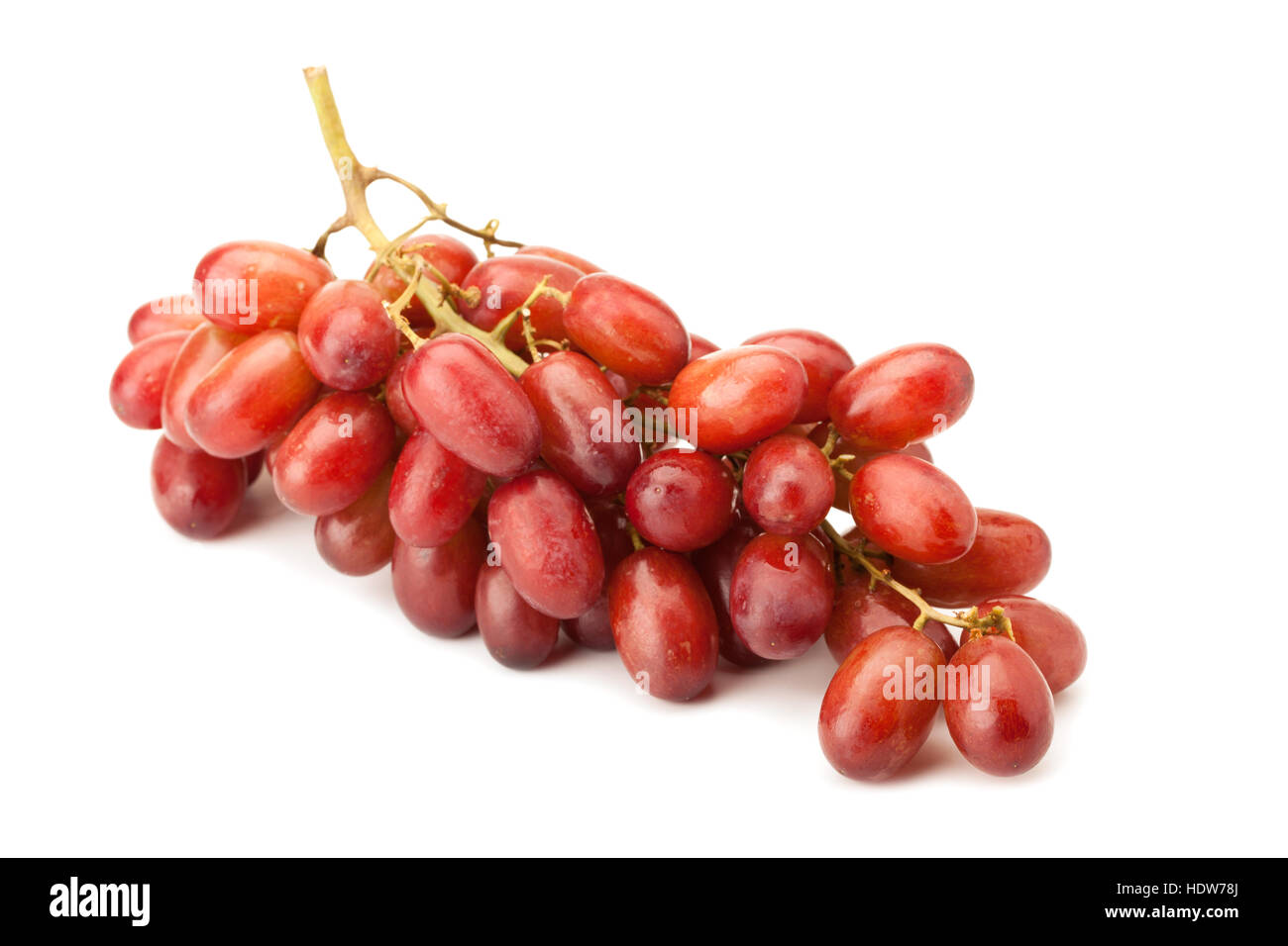 red seedless table grapes isolated on white background Stock Photo - Alamy