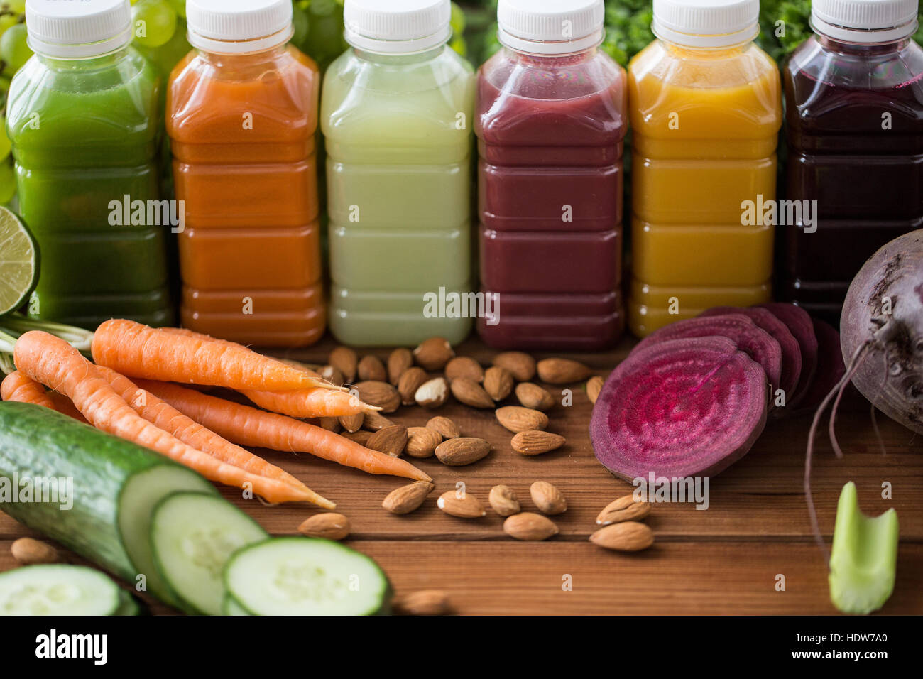 bottles with different fruit or vegetable juices Stock Photo - Alamy