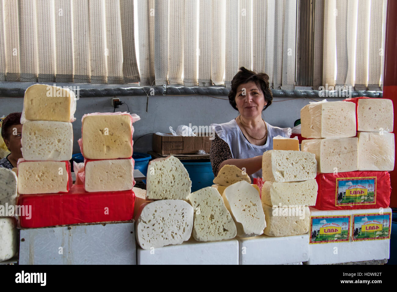 Woman cheese one person looking at camera hi-res stock photography and ...