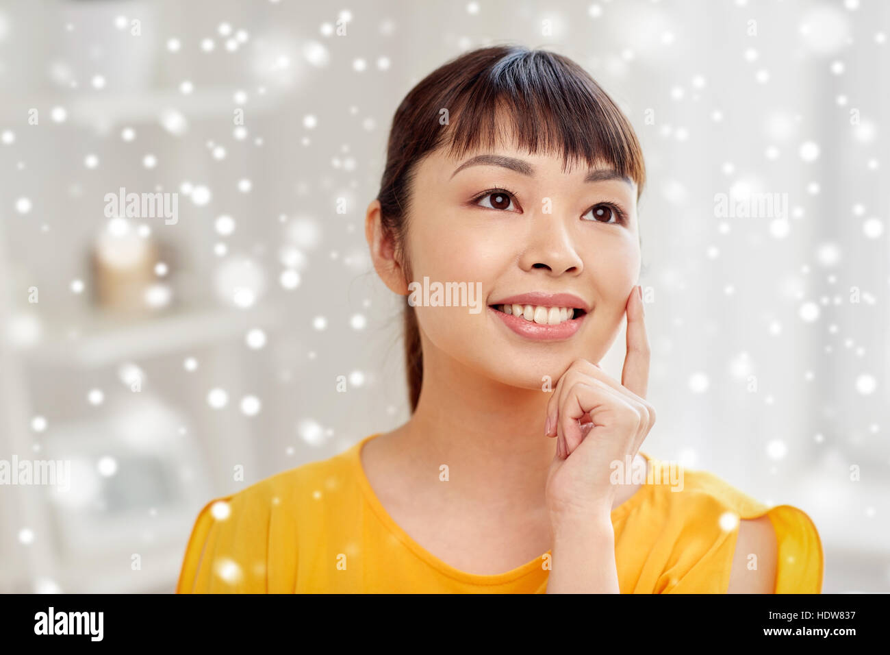 happy asian young dreaming woman face at home Stock Photo - Alamy